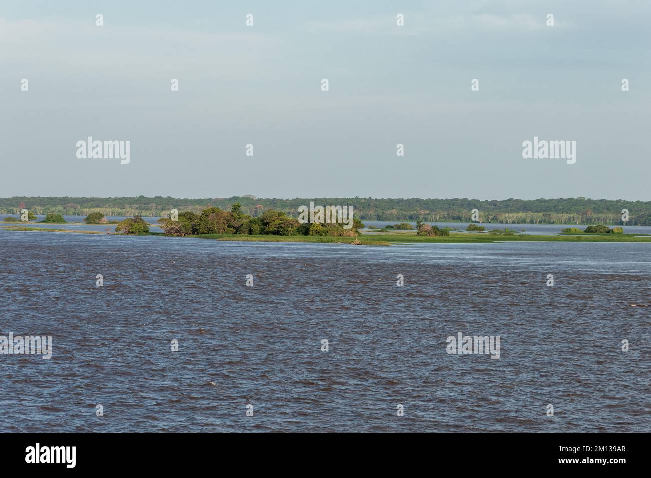 Tropical water landscape of the Rio Amazonas in Brazil seen from a ...