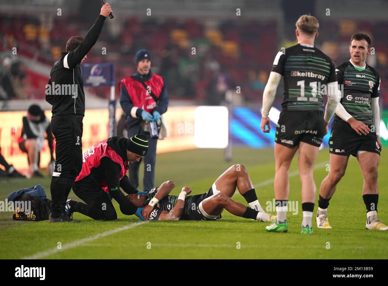 London Irish's Ben Loader receives treatment during the Heineken ...