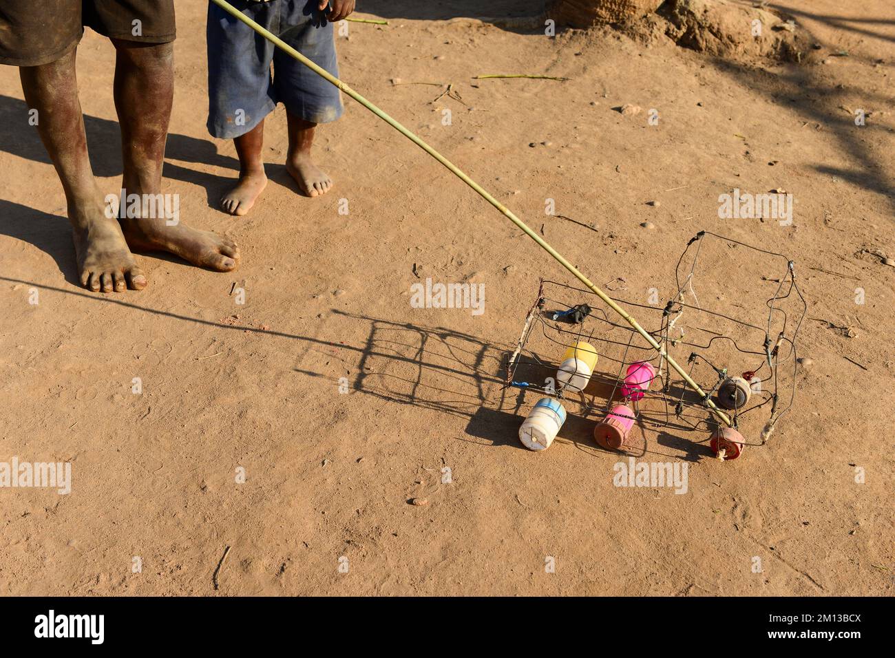 MALAWI, Thyolo, village Samuti, children with self-made toy cars ...