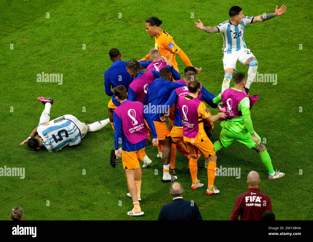 Argentina's Leandro Paredes lies on the pitch after being shoved by ...