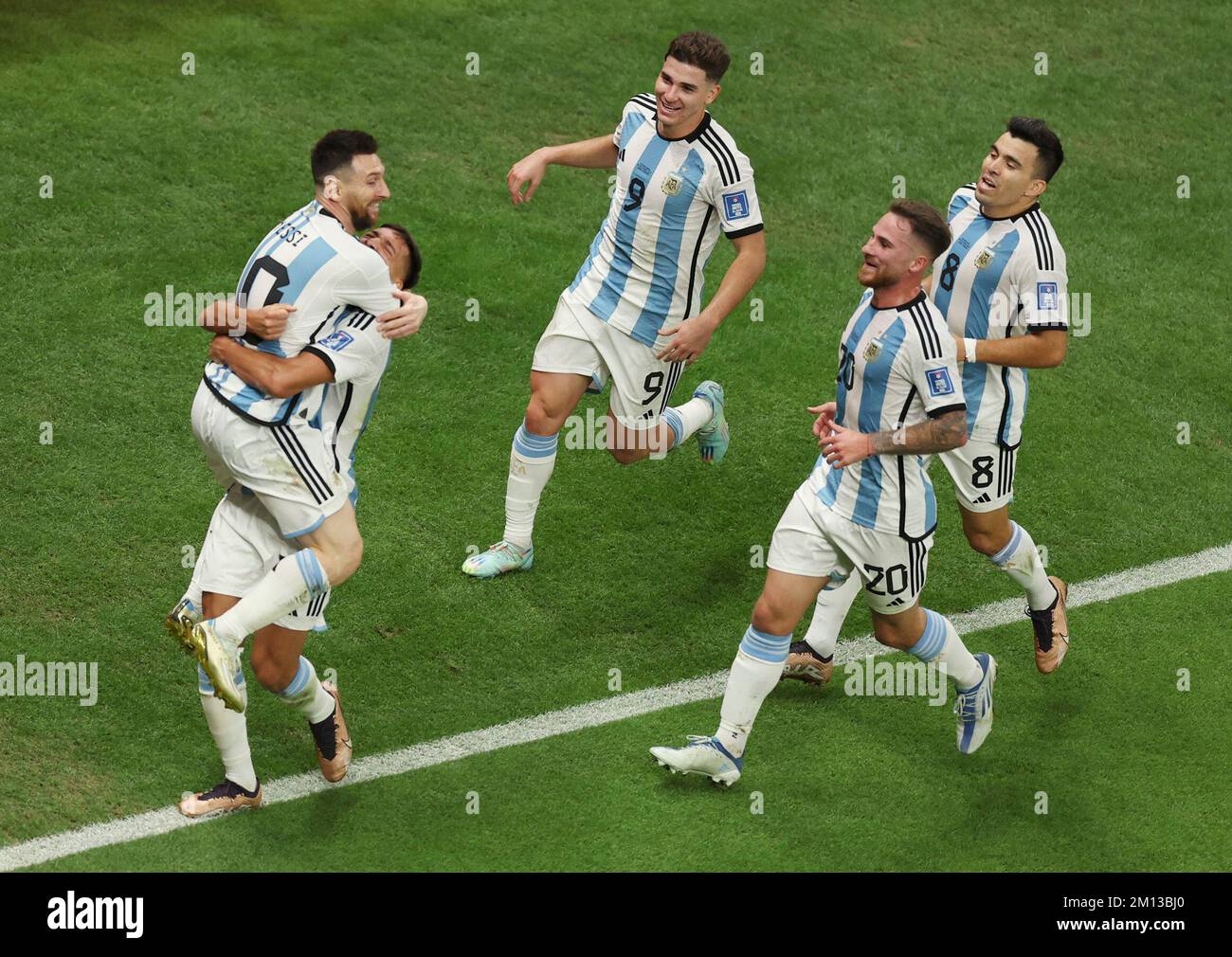 Lusail, Qatar. 9th Dec, 2022. Nahuel Molina (2nd L) of Argentina ...
