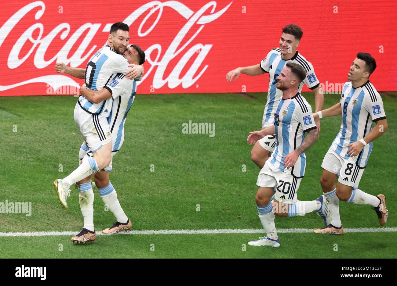 Lusail, Qatar. 9th Dec, 2022. Nahuel Molina (2nd L) of Argentina ...
