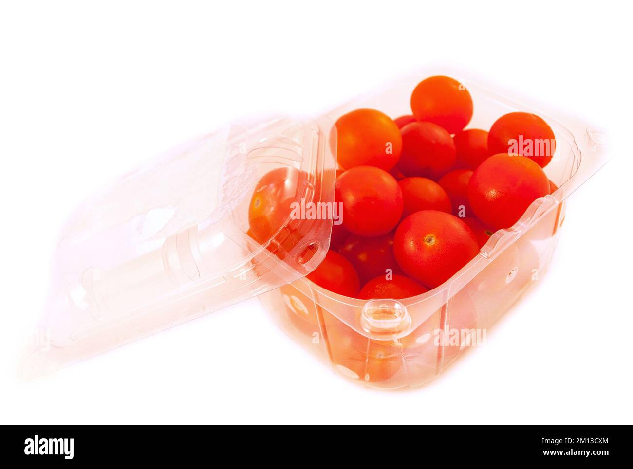 fresh cherry tomatoes in plastic pack, isolated Stock Photo - Alamy