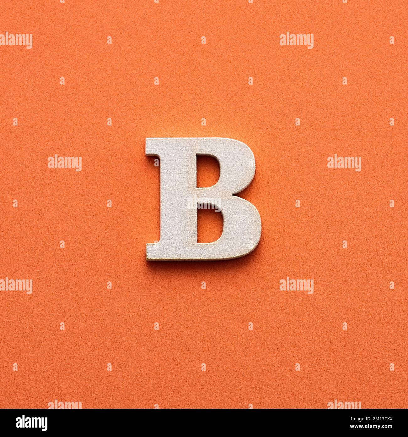 Alphabet letter B - White wooden letter on pink background Stock Photo ...