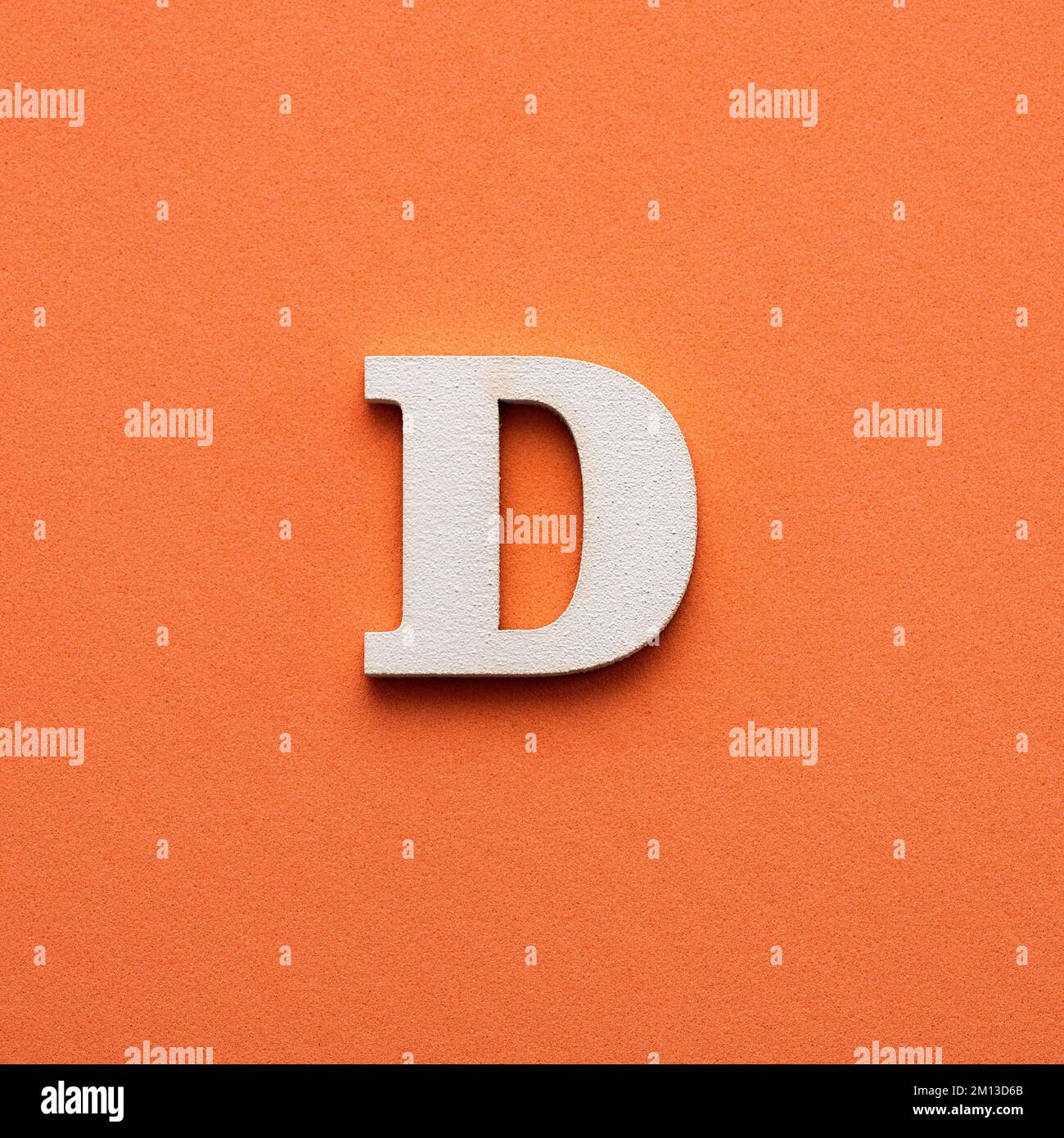 Alphabet letter D - White wooden letter on pink background Stock Photo ...
