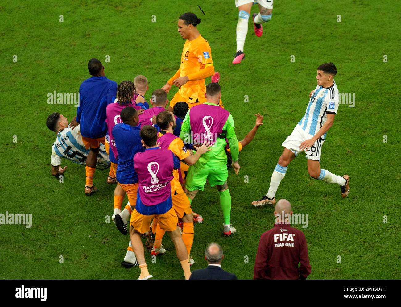 An object is thrown onto the pitch as Argentina's Leandro Paredes (left ...