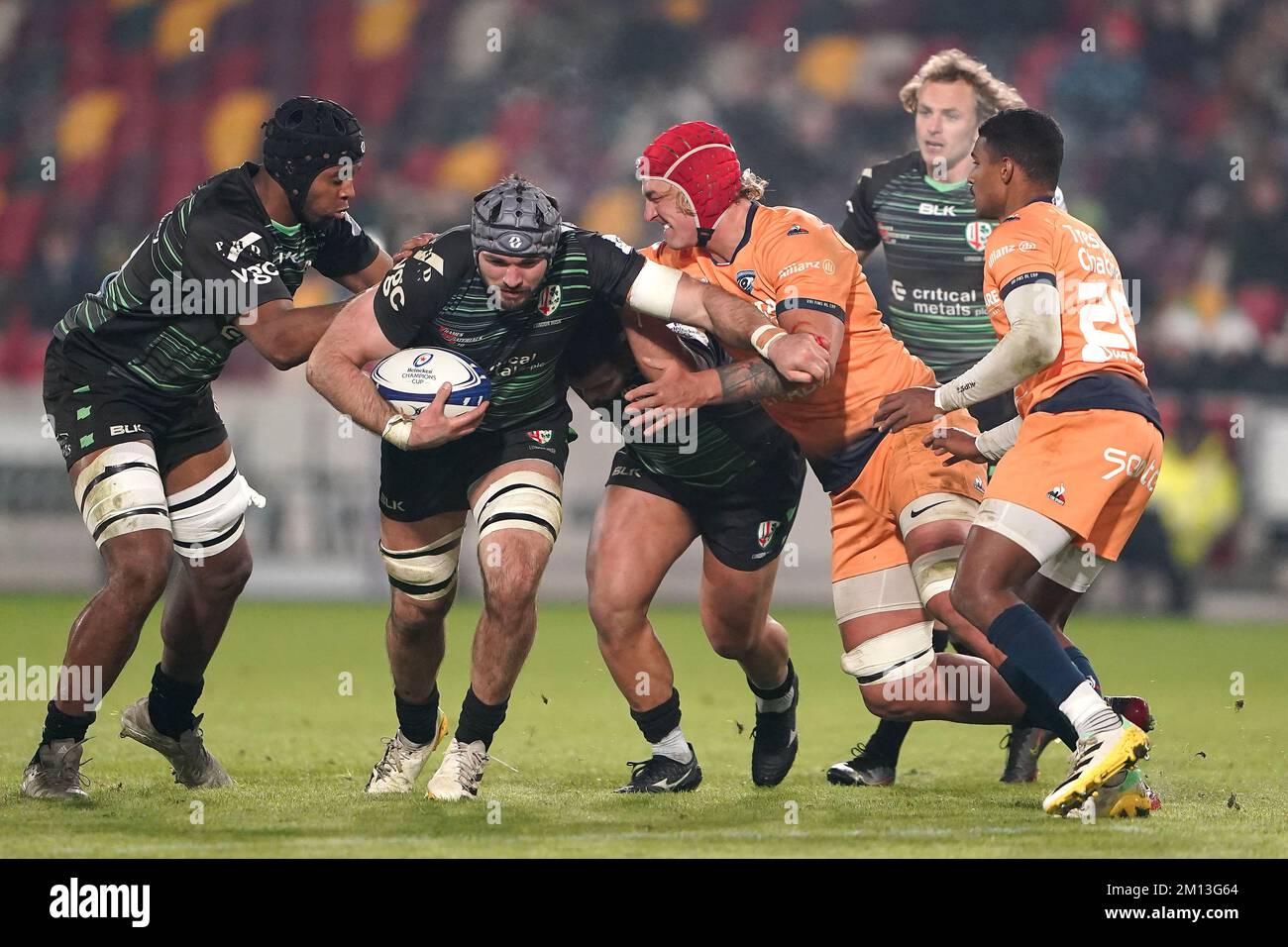 London Irish's Matt Rogerson (centre) is tackled by Montpellier's ...