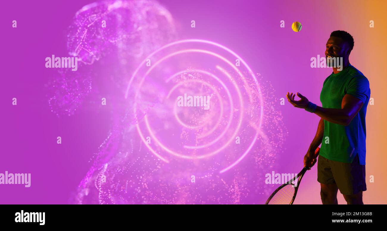 African american male tennis player with racket and ball standing by ...