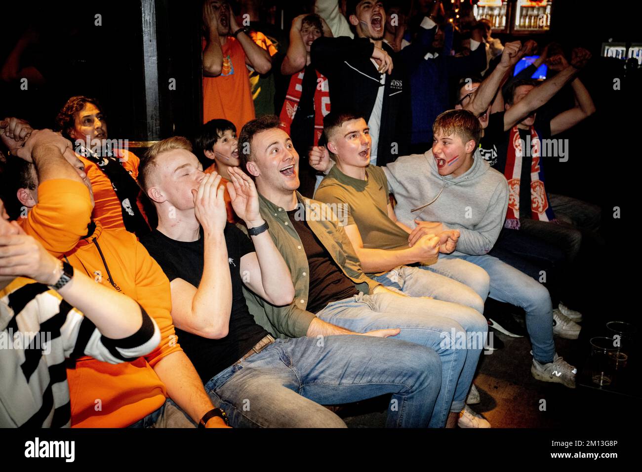 Rotterdam, Netherlands. 09th Dec, 2022. ROTTERDAM - Football fans watch ...
