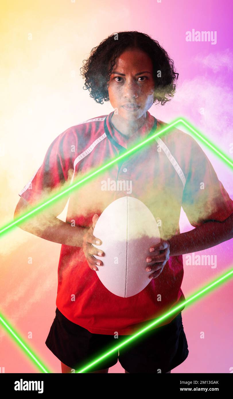 Composite of biracial female rugby player holding ball and standing ...