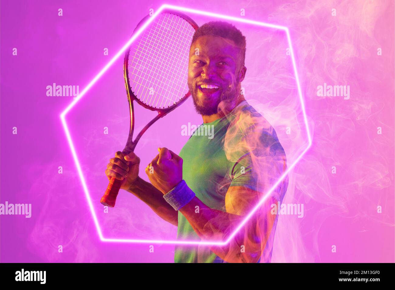 Cheerful african american male tennis player holding racket shaking ...