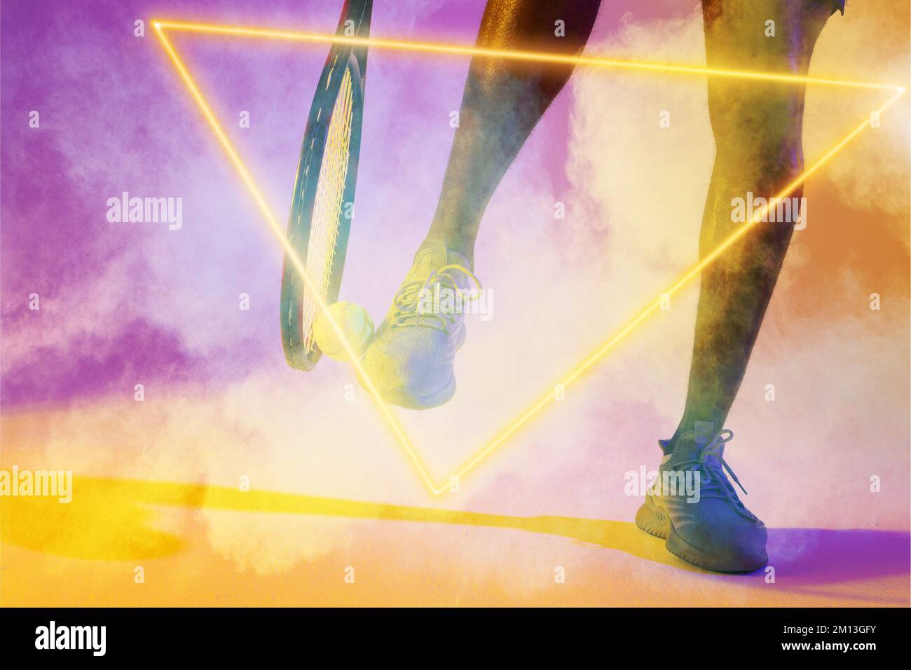 Low section of african american female player with tennis racket and ...