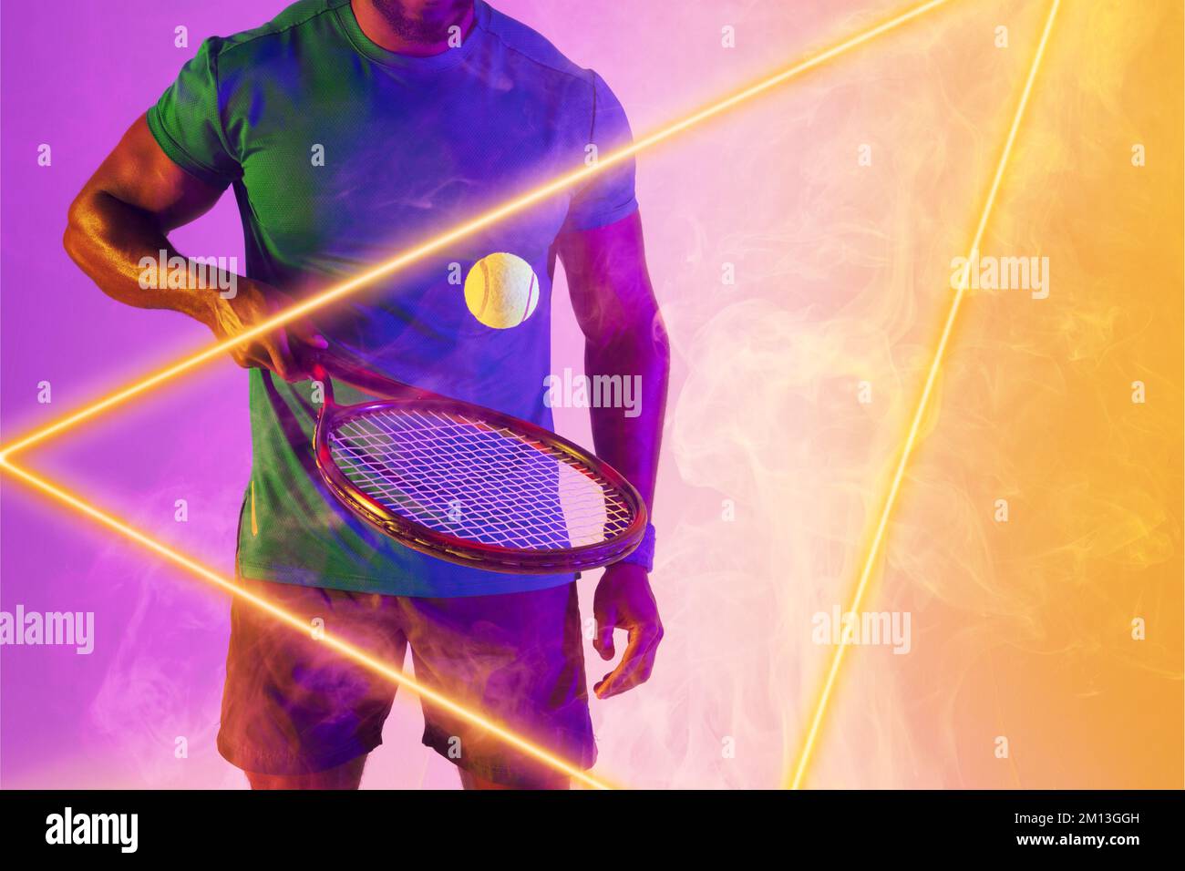 Midsection of african american male player bouncing ball with racket by ...