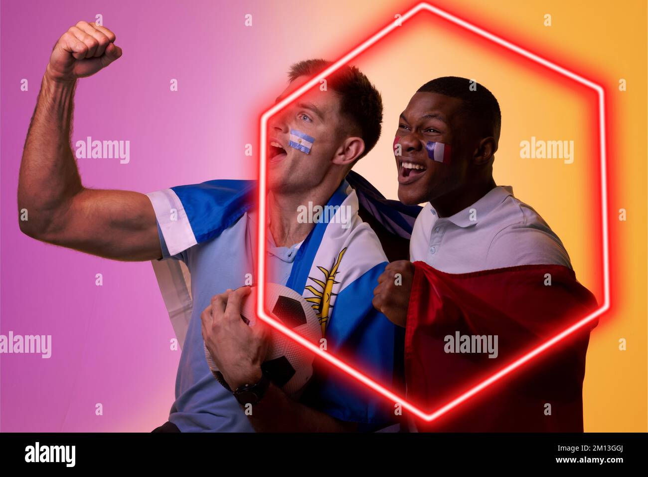 Diverse male fans cheering with argentina and france flags and face ...