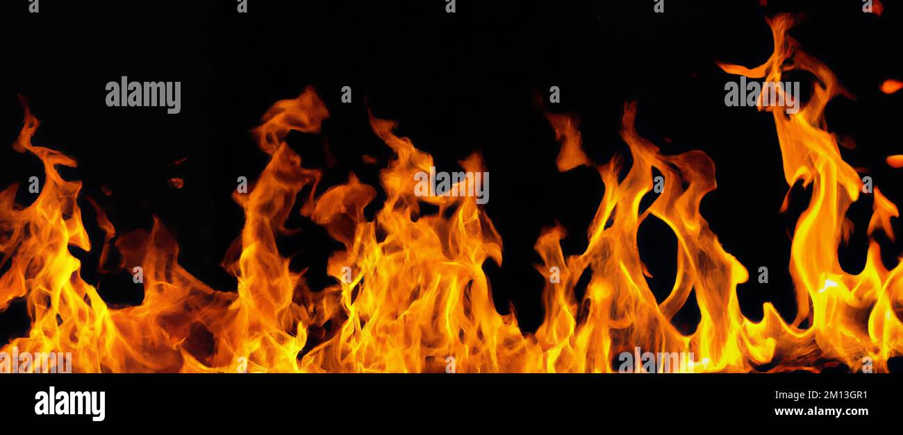 A panoramic illustration of fire and flame isolated on a dark ...