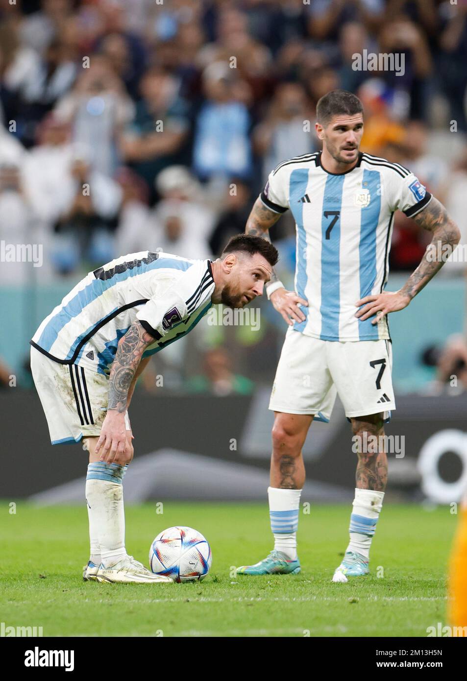 Lusail, Qatar. 9th Dec, 2022. Lionel Messi (L) of Argentina looks on ...