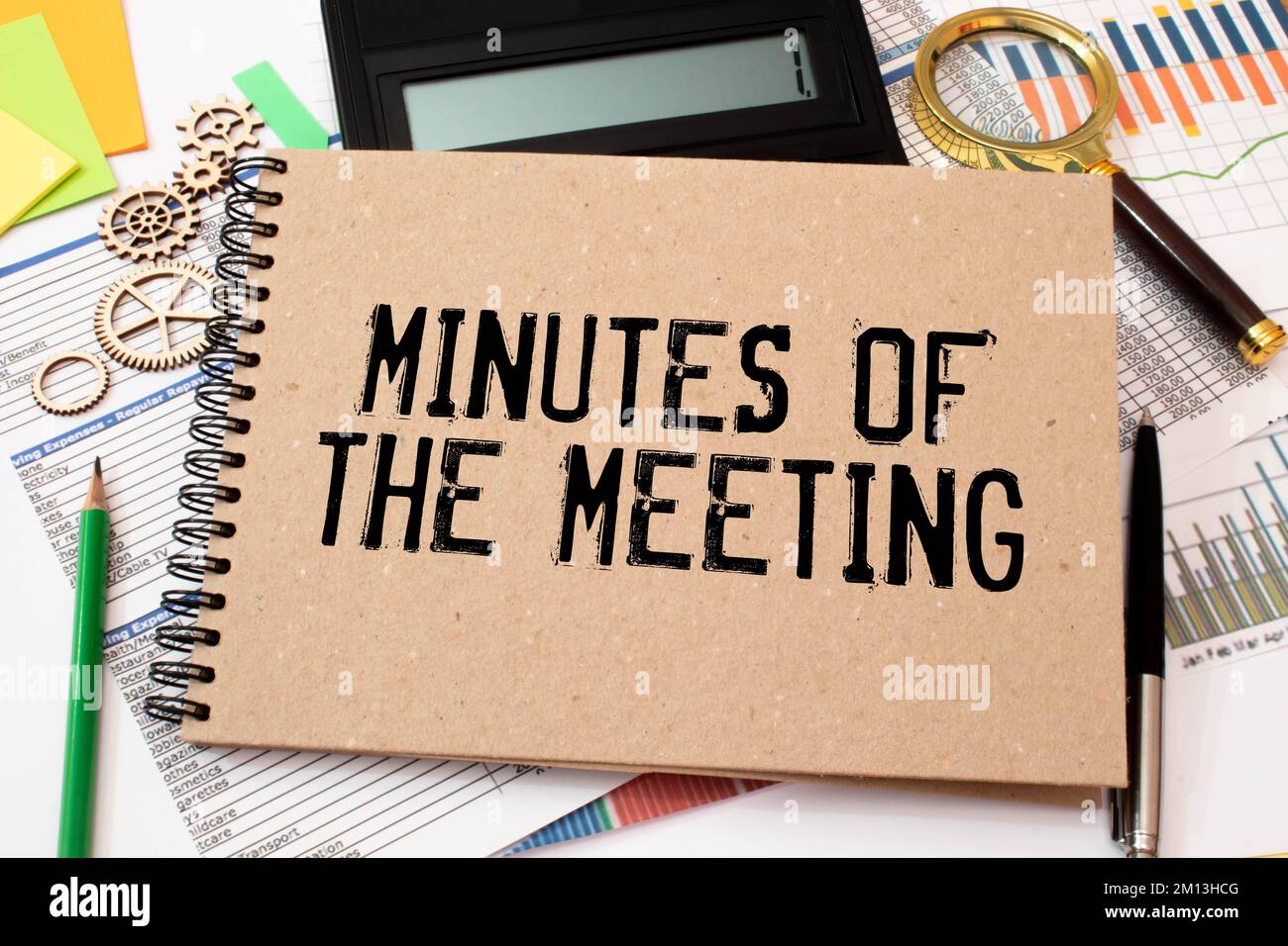 Closeup on businesswoman holding a card with text MINUTES OF THE ...