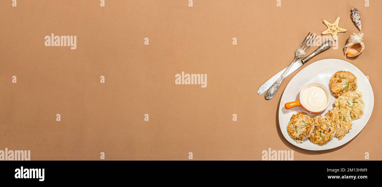 Hake fillet fried in batter. Sauce, fresh rosemary. Vegetarian healthy ...