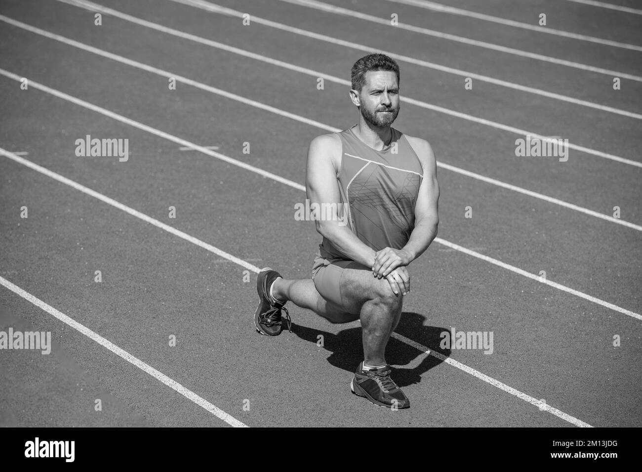 Always in good shape. sportsman flex muscles outdoor. muscular guy do ...