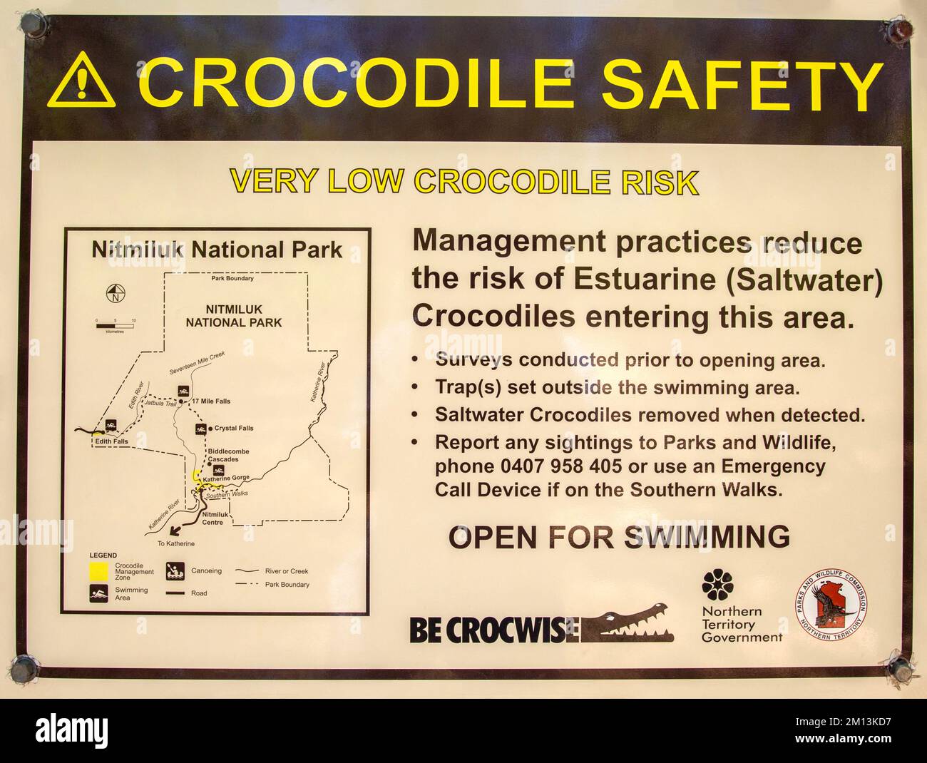 Crocodile safety sign saying that it is very low crocodile risk Stock ...