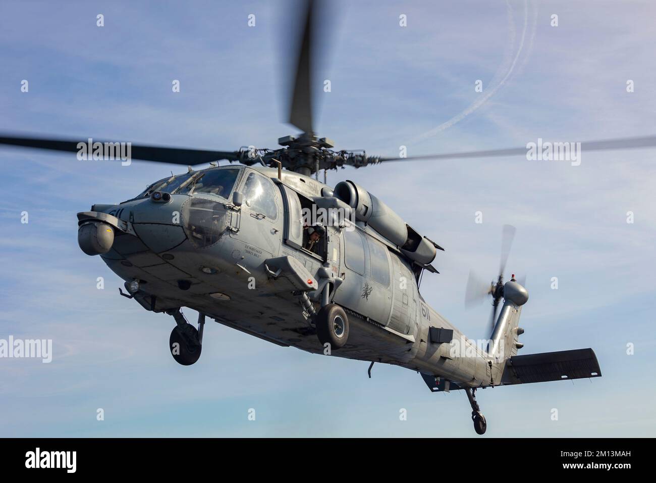 An MH-60S Sea Hawk helicopter, assigned to Helicopter Sea Combat ...