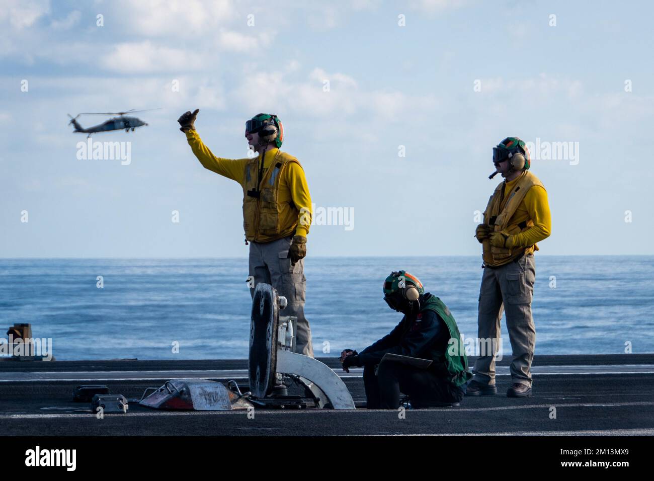221209-N-WU964-1027 PHILIPPINE SEA (Dec. 9, 2022) Sailors prepare ...