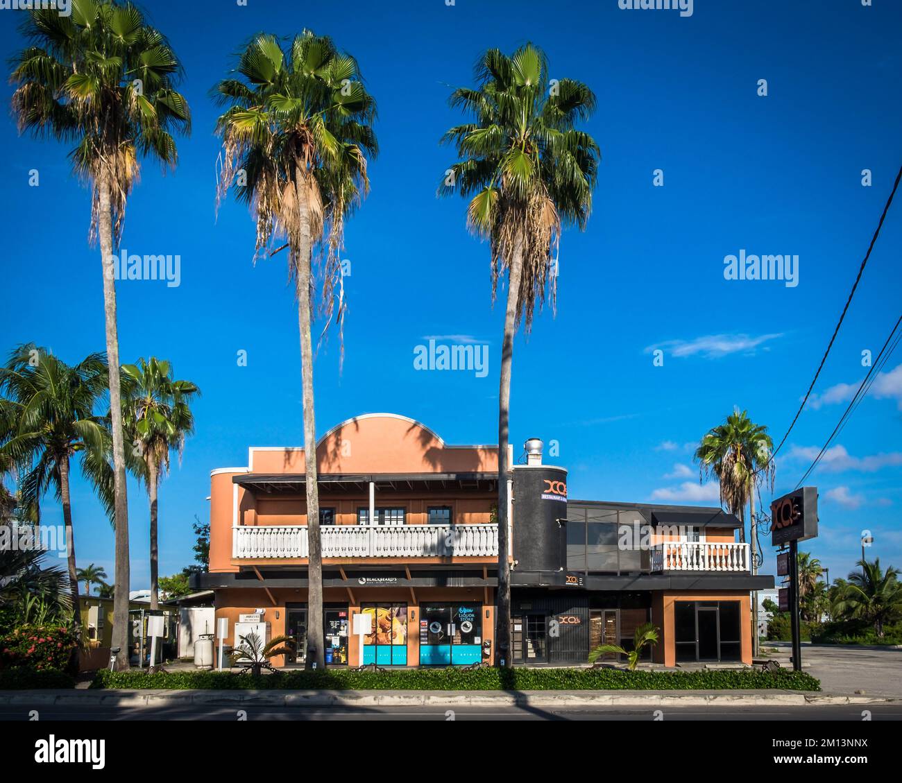 Grand Cayman, Cayman Islands, Aug 2022, view of XQ's building, a bar ...