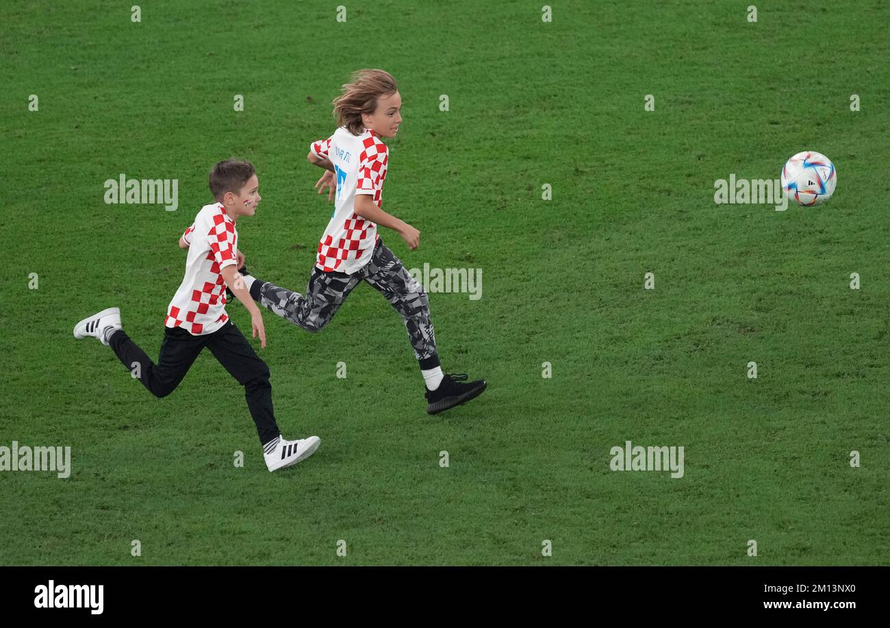Al Rayyan, Qatar. 9th Dec, 2022. Child (R) of Luka Modric of Croatia ...