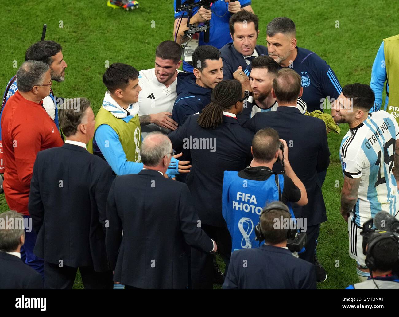 Argentina's Lionel Messi and Netherlands coach Edgar Davids at the final whistle as Netherlands ...