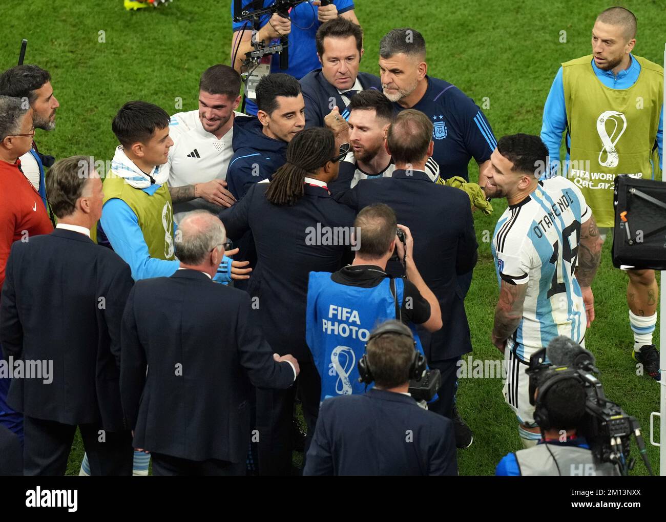 Argentina's Lionel Messi and Netherlands coach Edgar Davids at the final whistle as Netherlands ...