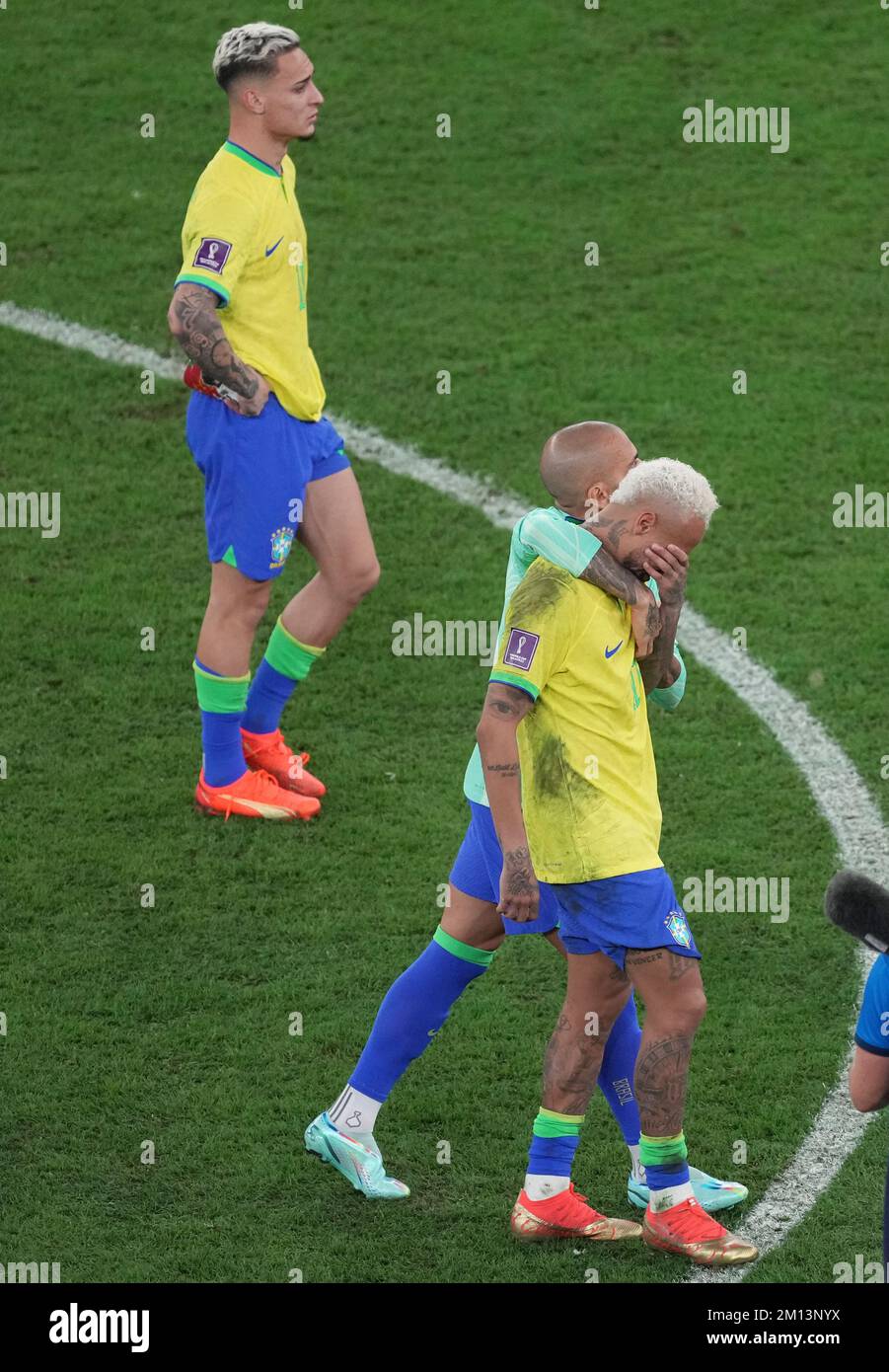 Al Rayyan, Qatar. 9th Dec, 2022. Neymar (R) of Brazil cries as he walks ...