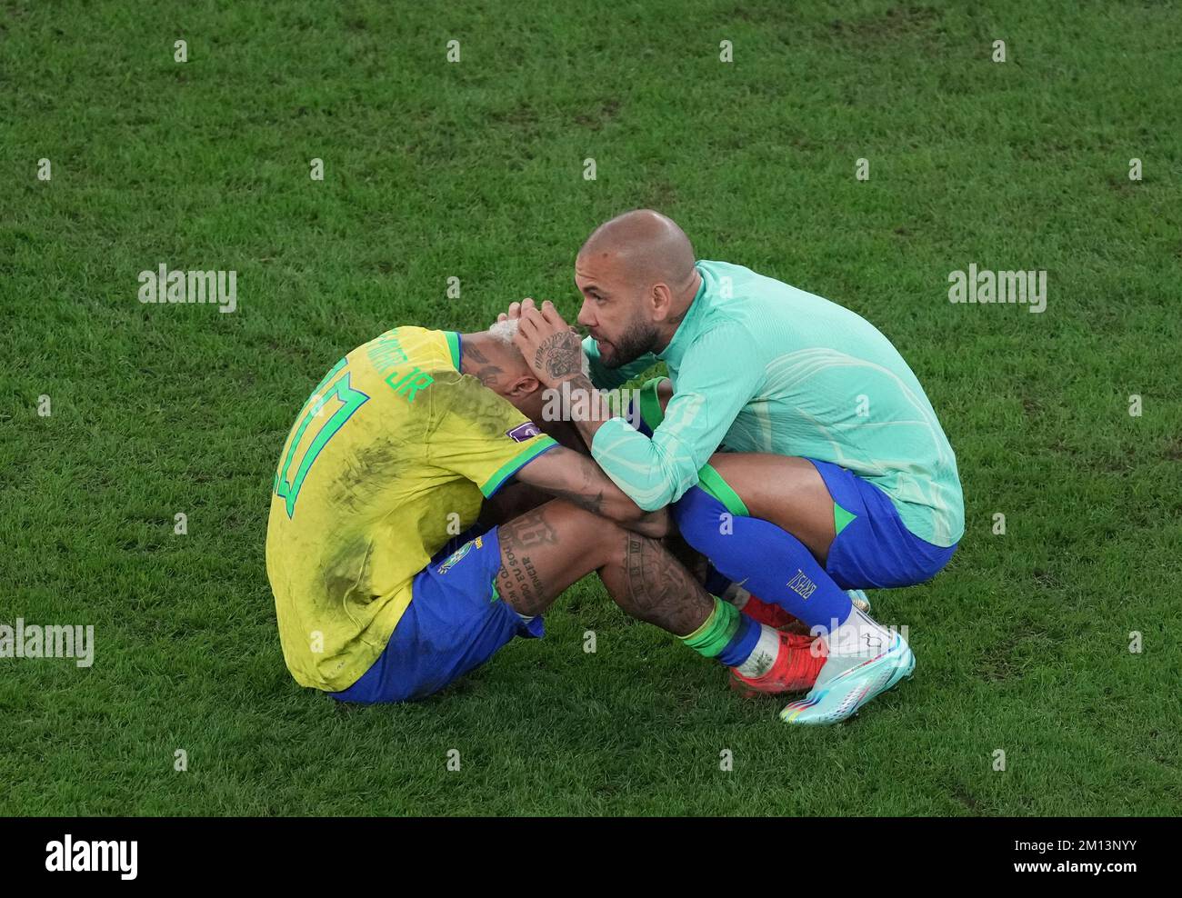 Al Rayyan, Qatar. 9th Dec, 2022. Neymar (L) of Brazil cries as teammate ...