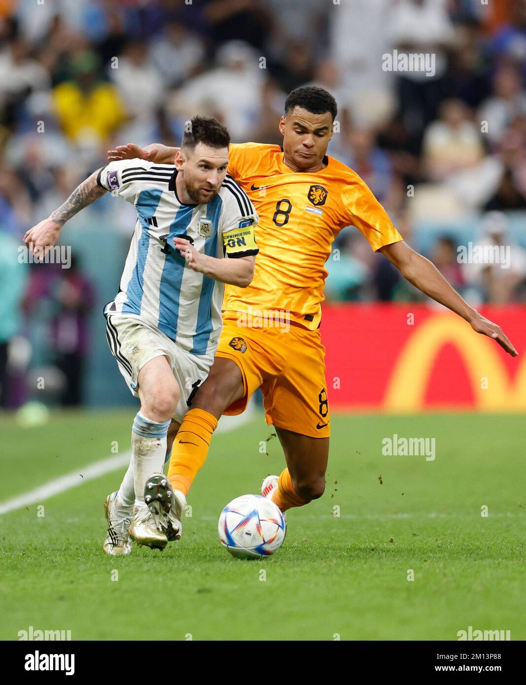 Lusail, Qatar. 9th Dec, 2022. Lionel Messi (L) of Argentina vies with ...