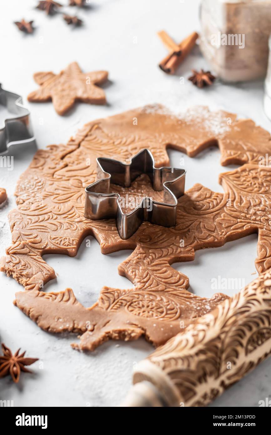 Baking ingredients for Christmas patterned cookies and gingerbread ...