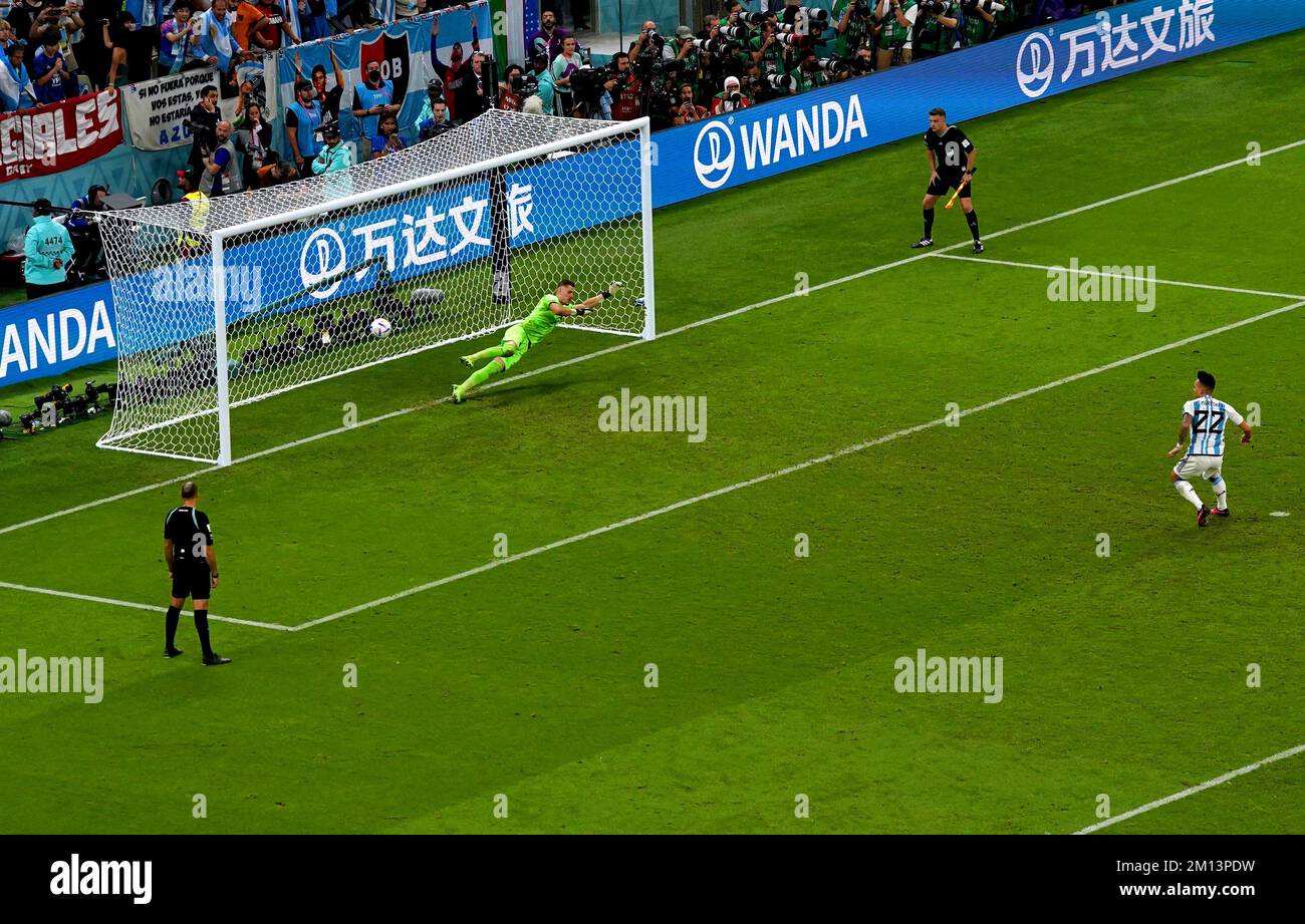 Argentina's Lautaro Martinez scores the winning penalty of the penalty ...