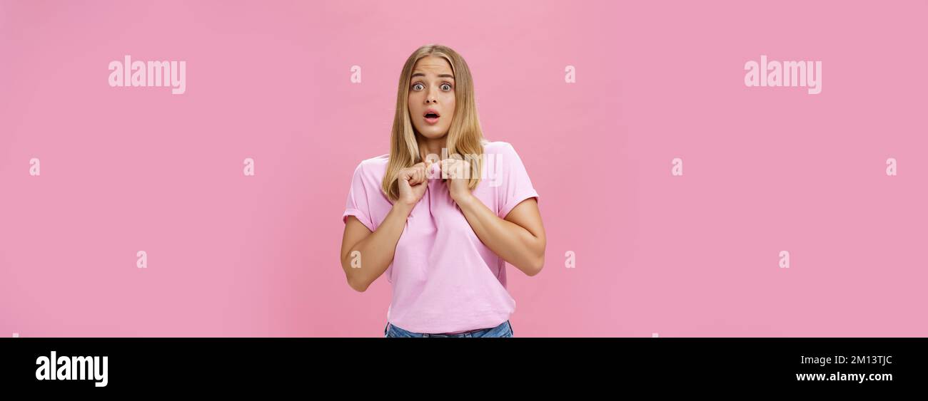 Woman gasping from fright being scared by someone pressing clenched ...