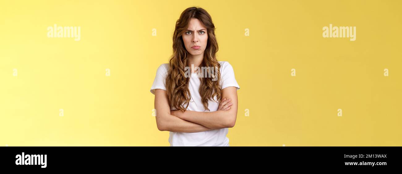 Upset jealous moody clingy girlfriend sulking offended cross hands ...