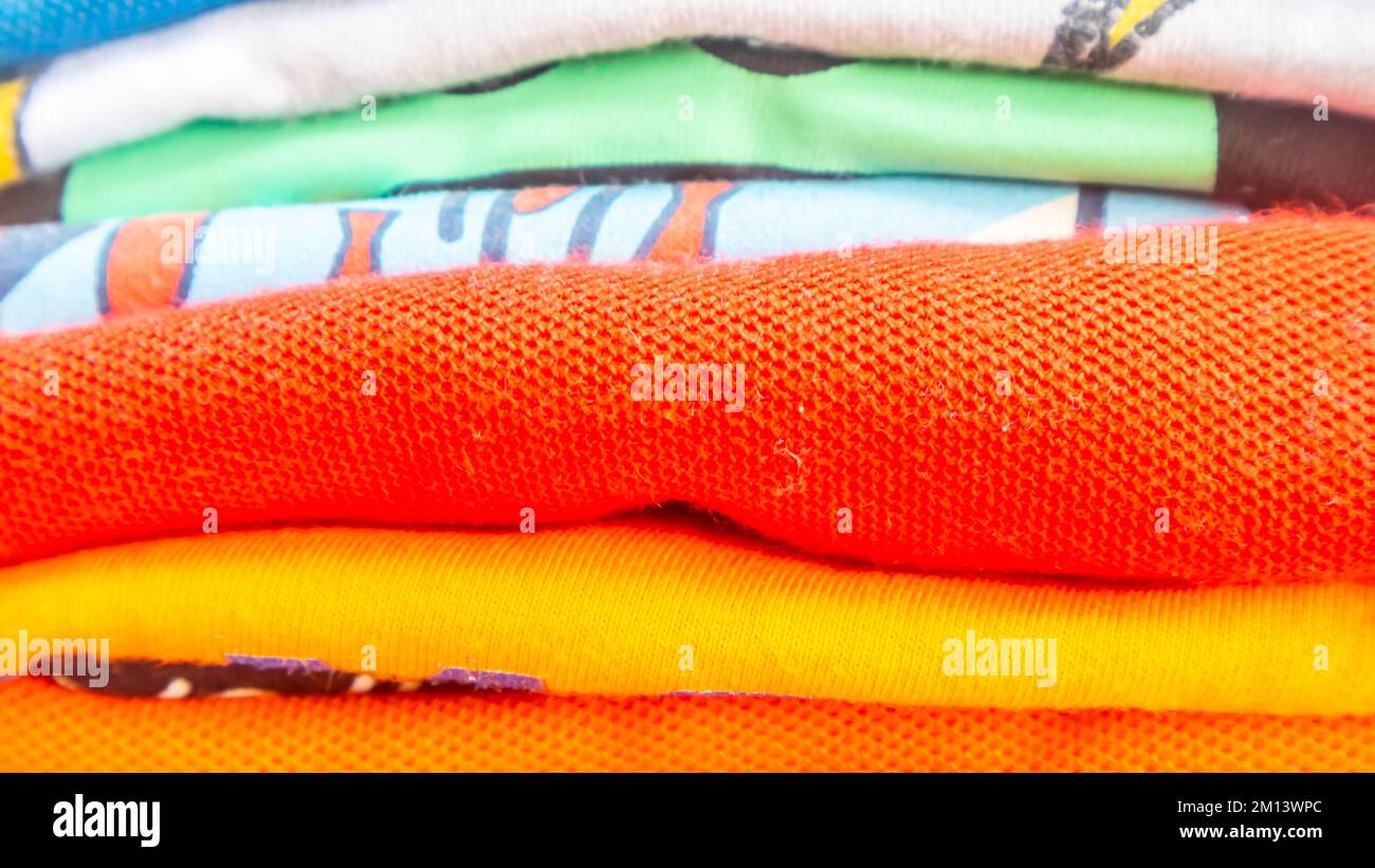 pile of clothes as background Stock Photo - Alamy