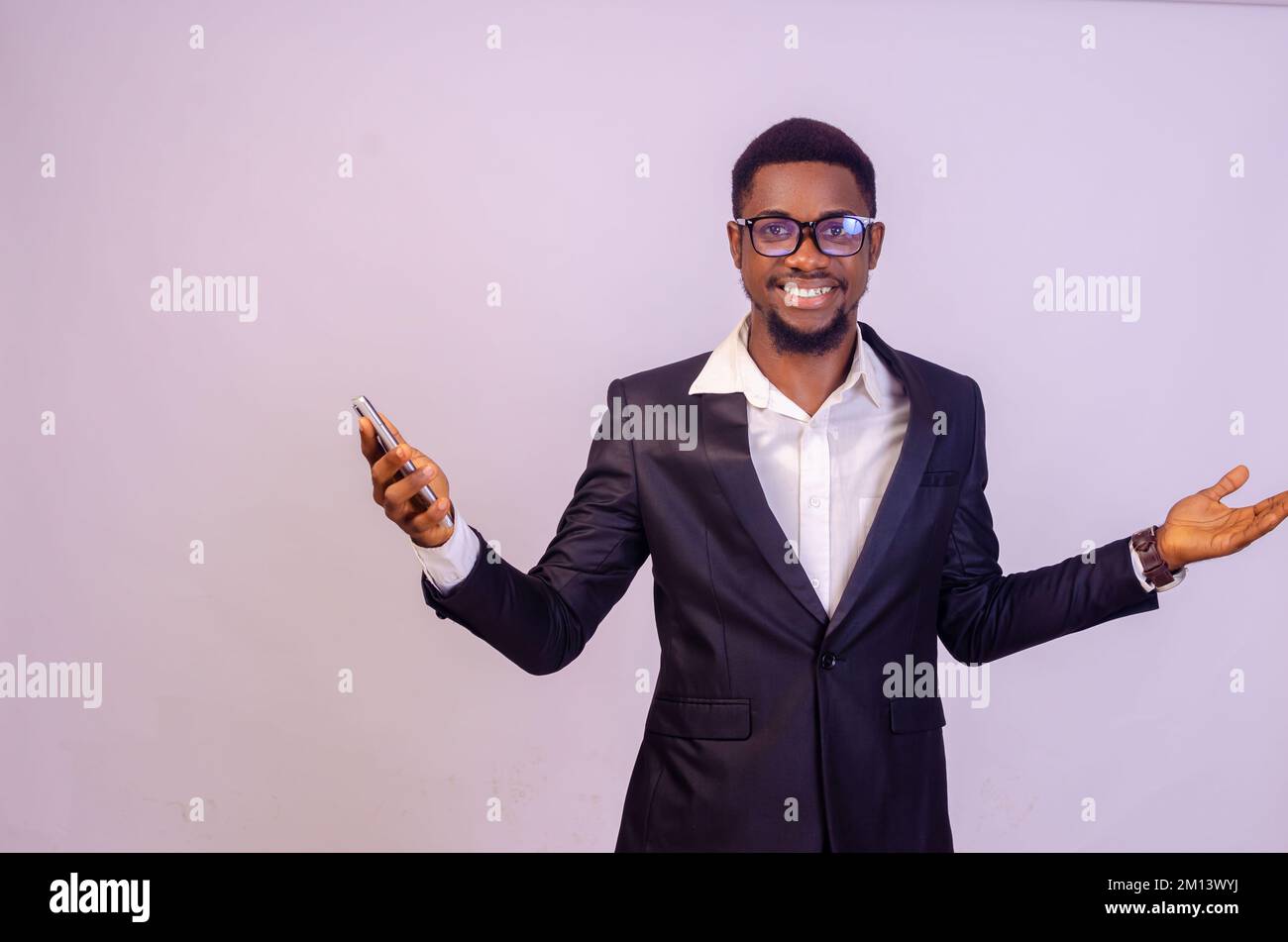 excited african businessman isolated white background Stock Photo - Alamy