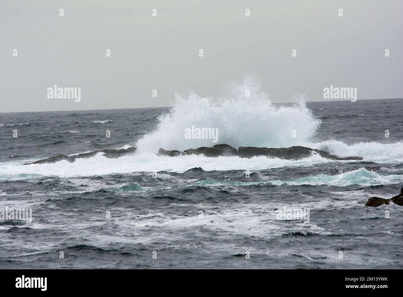 Breaking waves at the coast of the Norwegian Sea near Nyksund in the ...