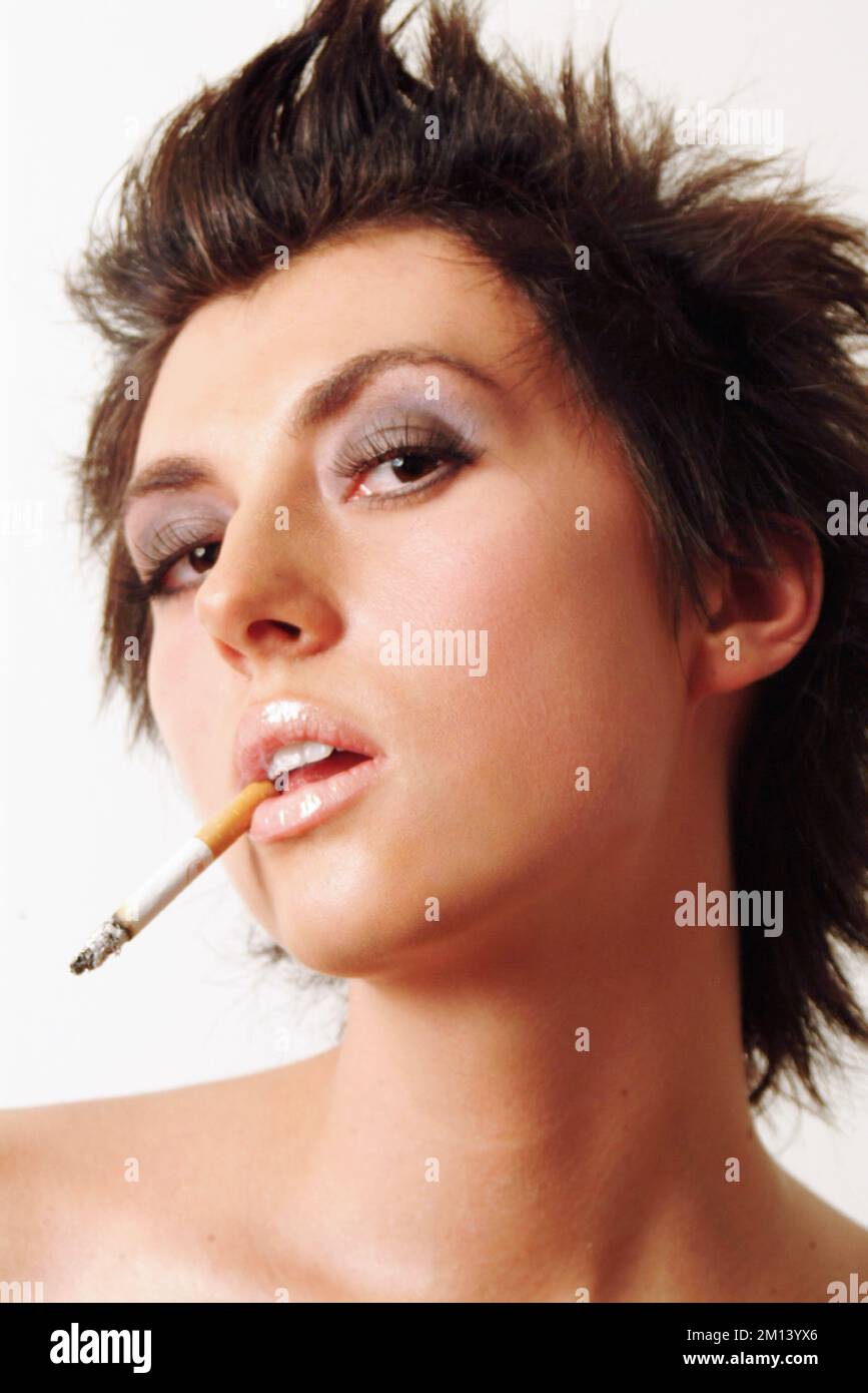 Polish fashion model smoking a cigarette Stock Photo - Alamy