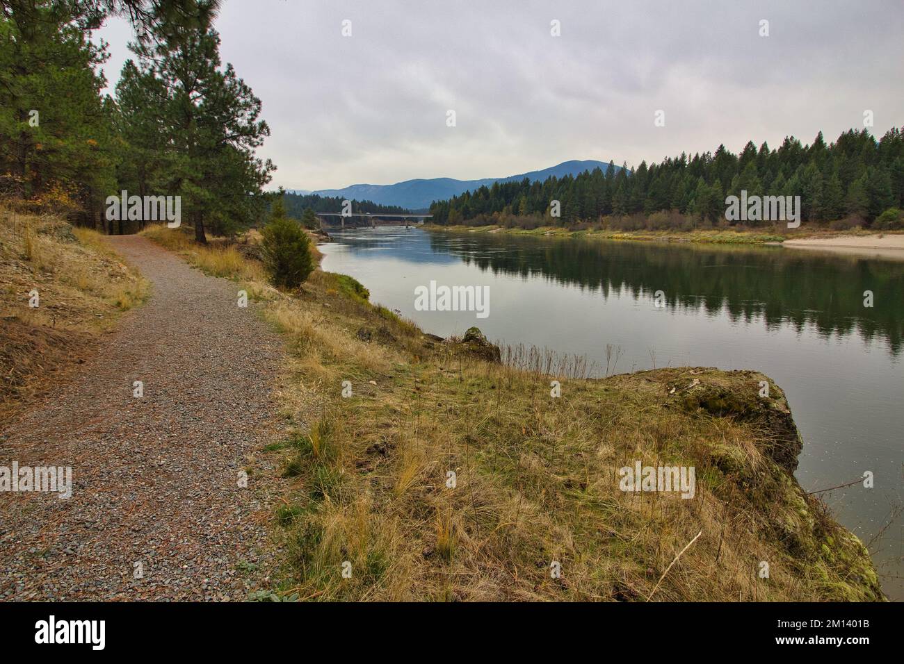 Trail alongside the Clark Fork River at Thompson Falls State Park Stock ...