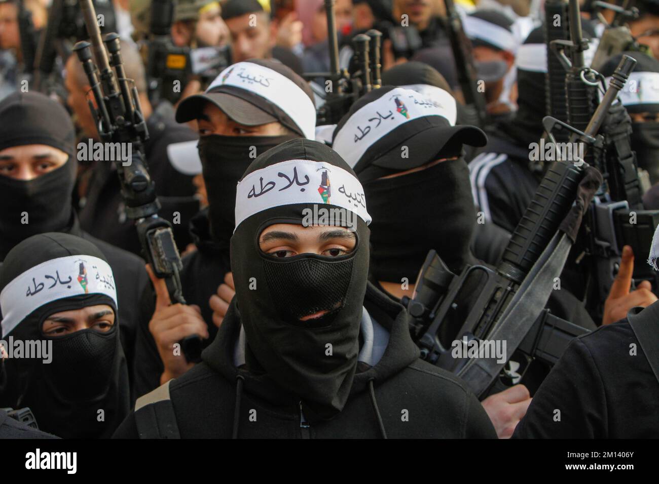 Palestinian gunmen from the Balata Brigade of the Fatah movement and ...