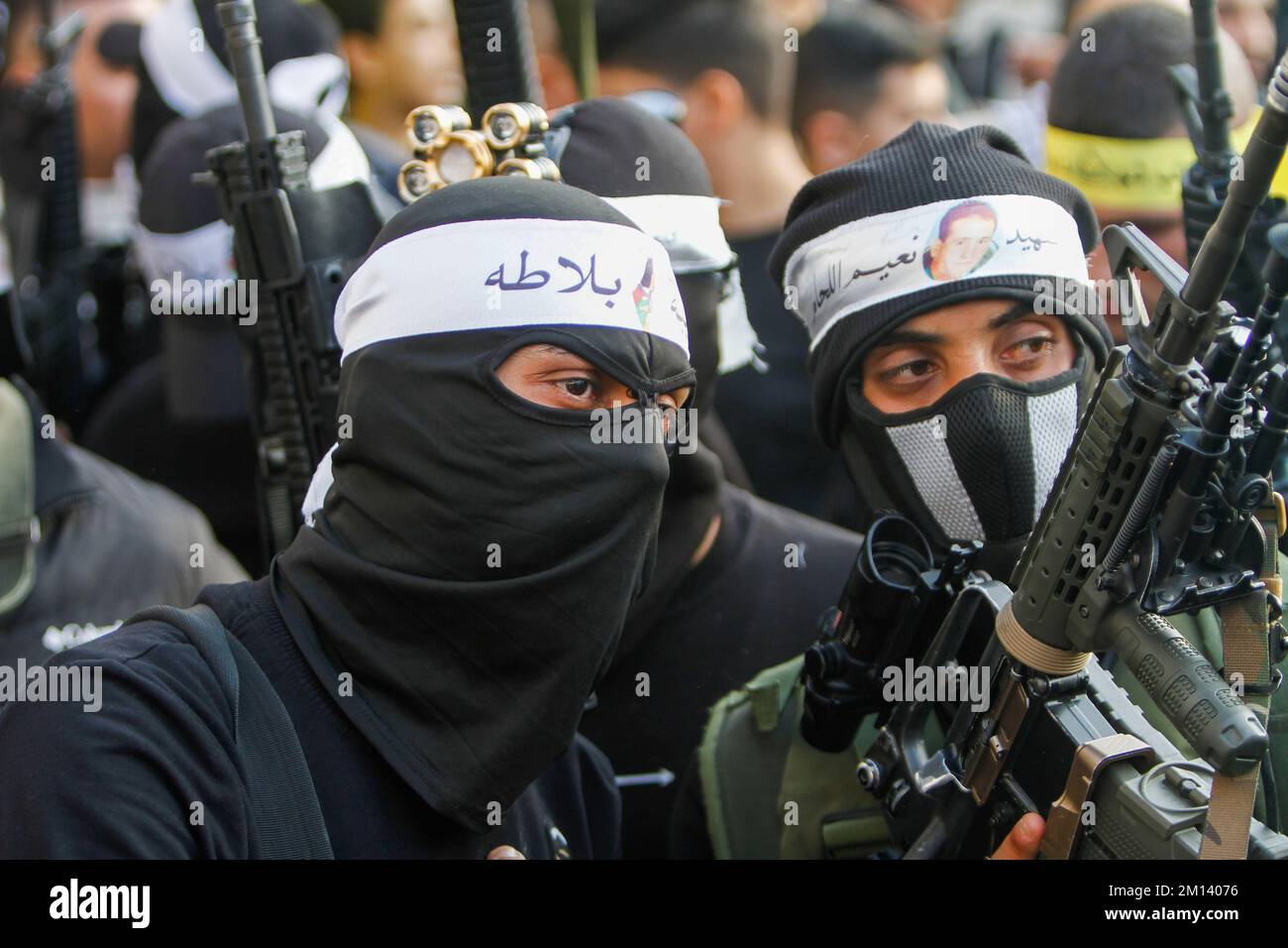 Palestinian gunmen from the Balata Brigade of the Fatah movement and ...