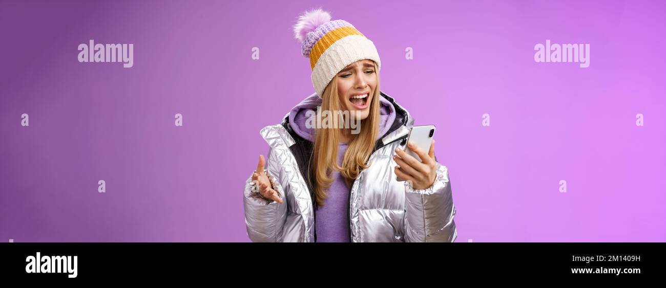 Bothered complaining dissatisfied cute blond girl yelling stupid ...