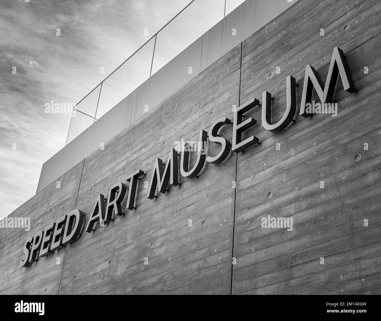 A grayscale of the "Speed Art Museum" building with its name on the ...