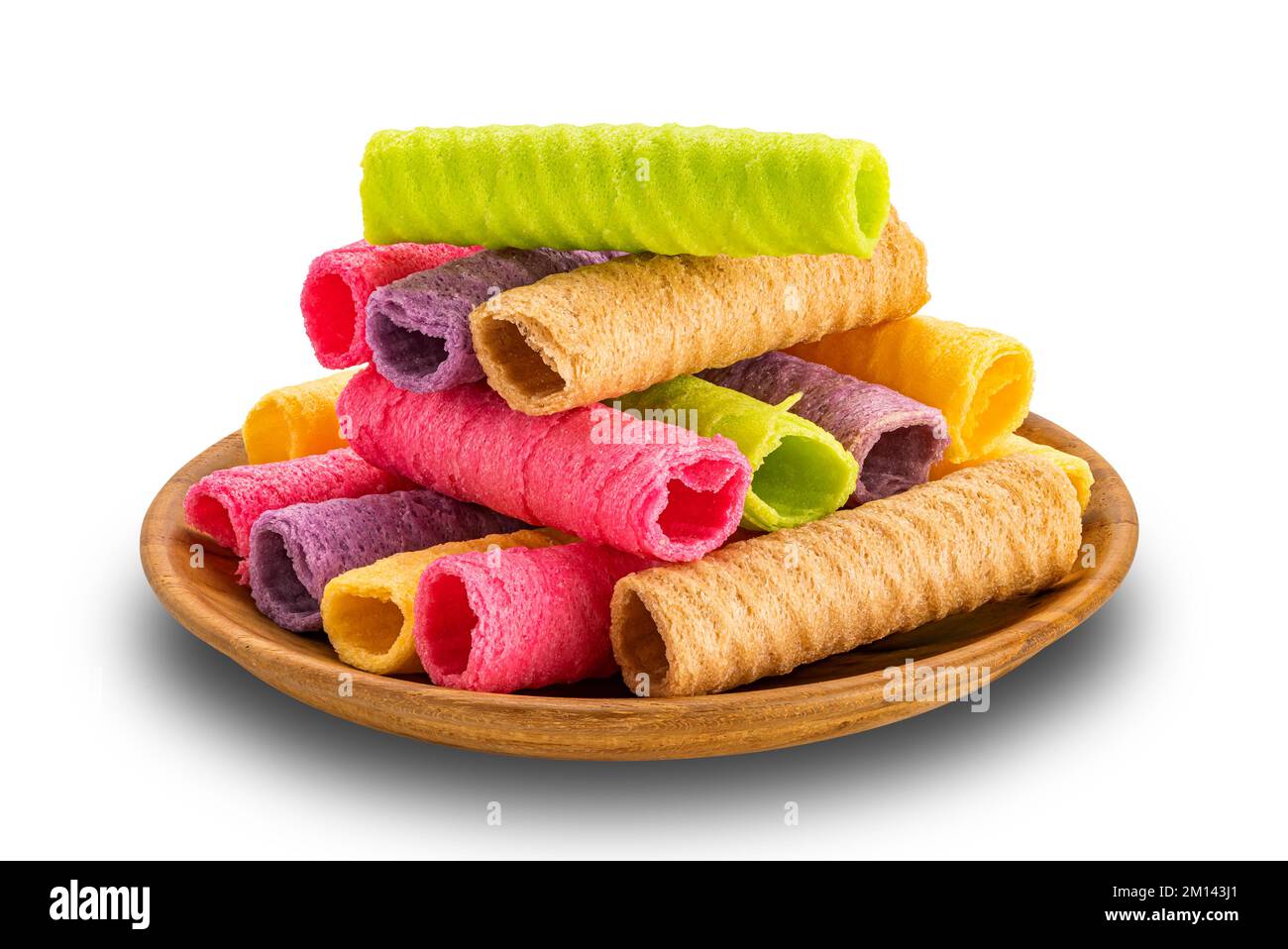 Closeup view pile of crispy homemade colorful coconut wafer tube in ...