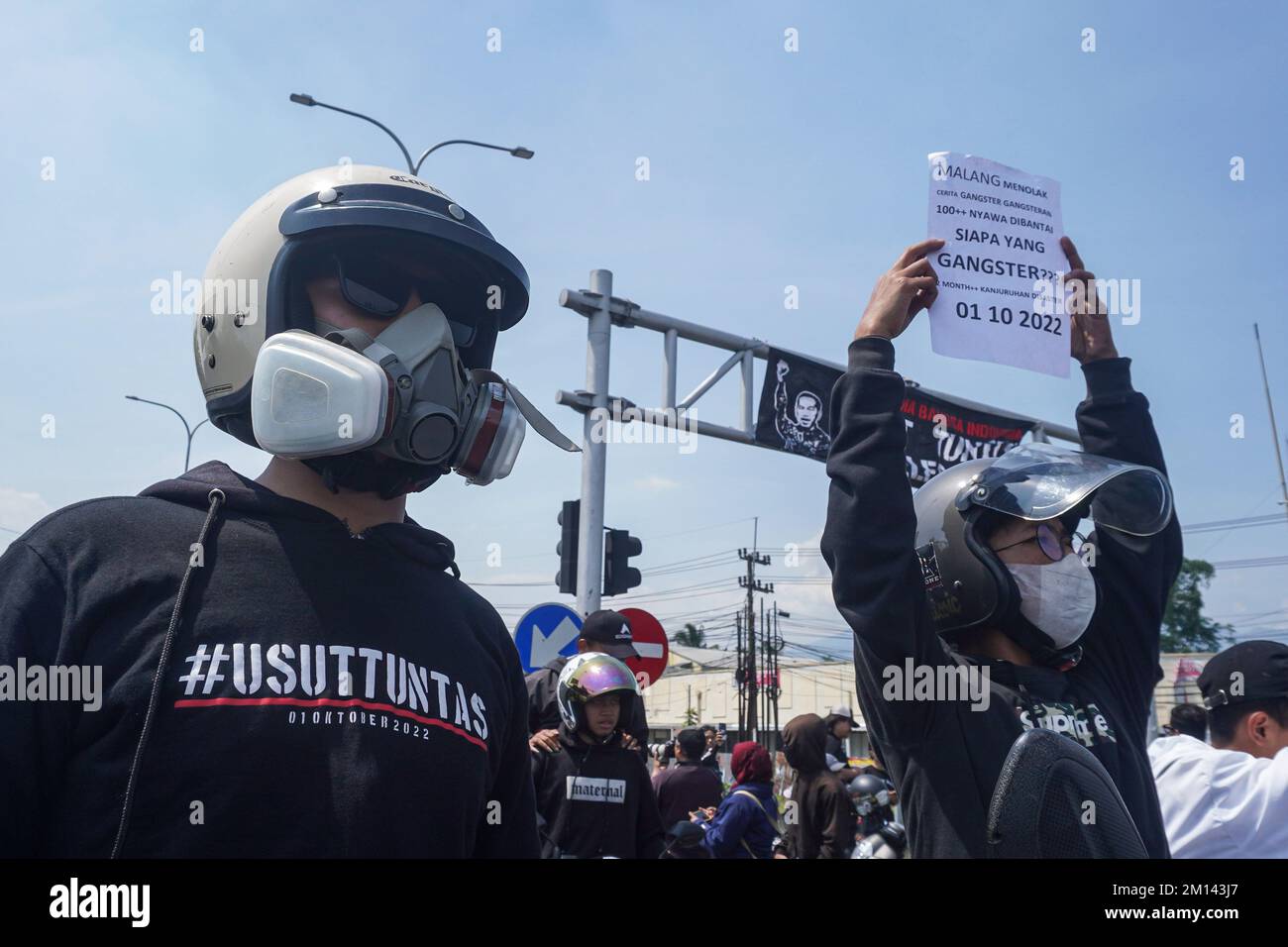 Malang, East Java, Indonesia. 8th Dec, 2022. A demonstrator wearing a ...