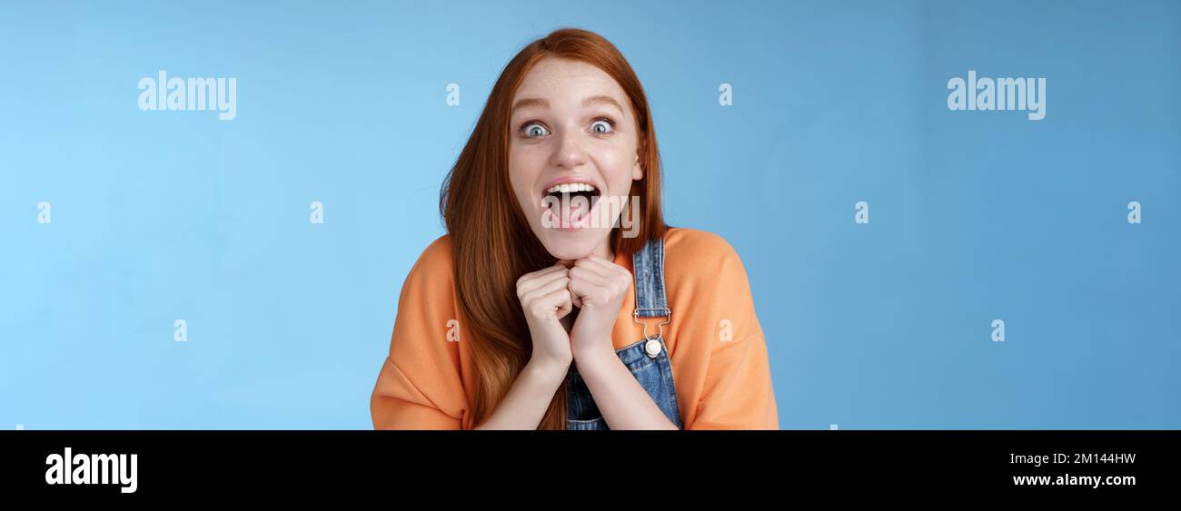 Cute redhead european girl blue eyes freckles reacting amused shocking ...