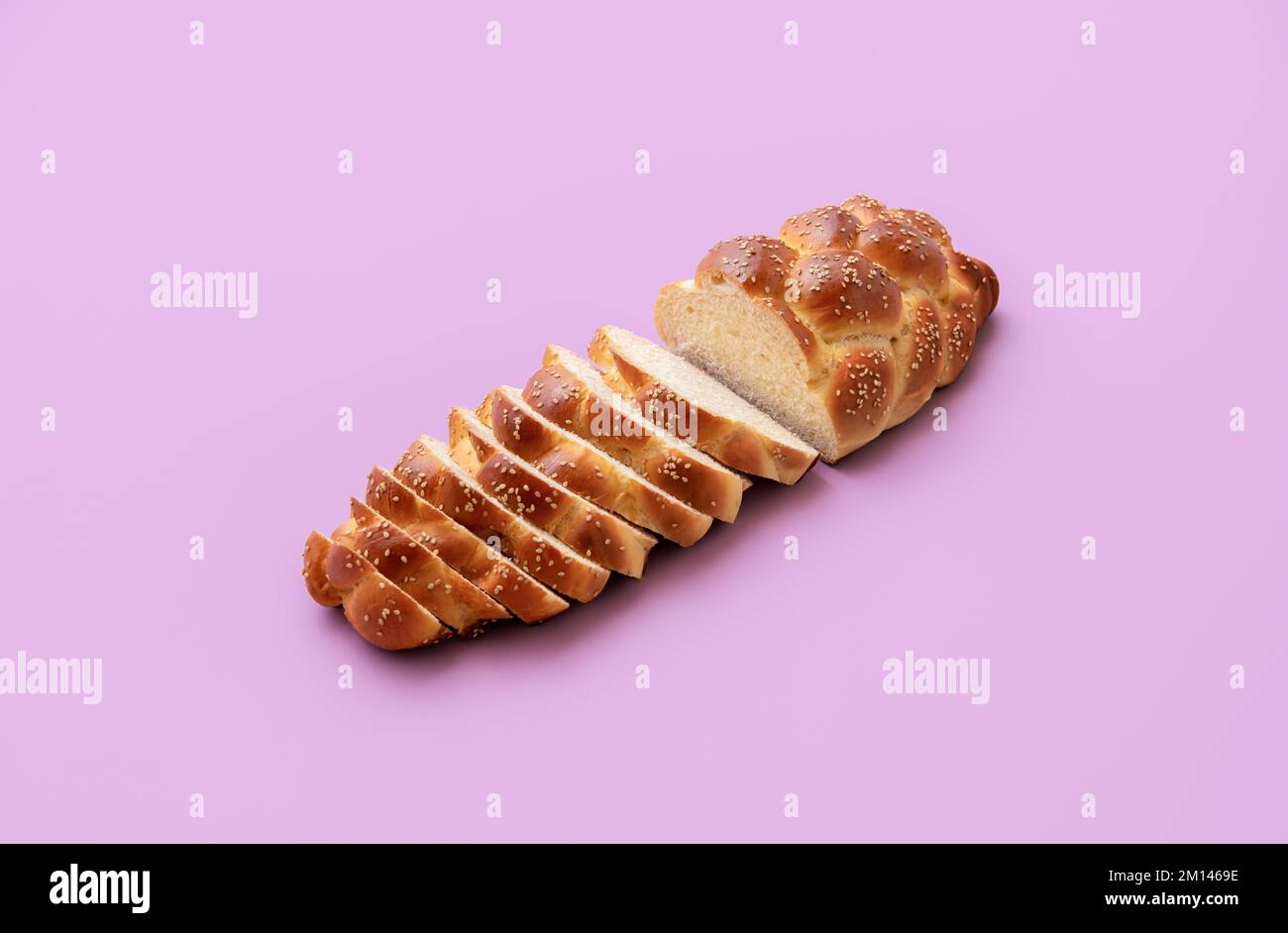 Homemade challah bread minimalist on a purple table. Delicious braided ...